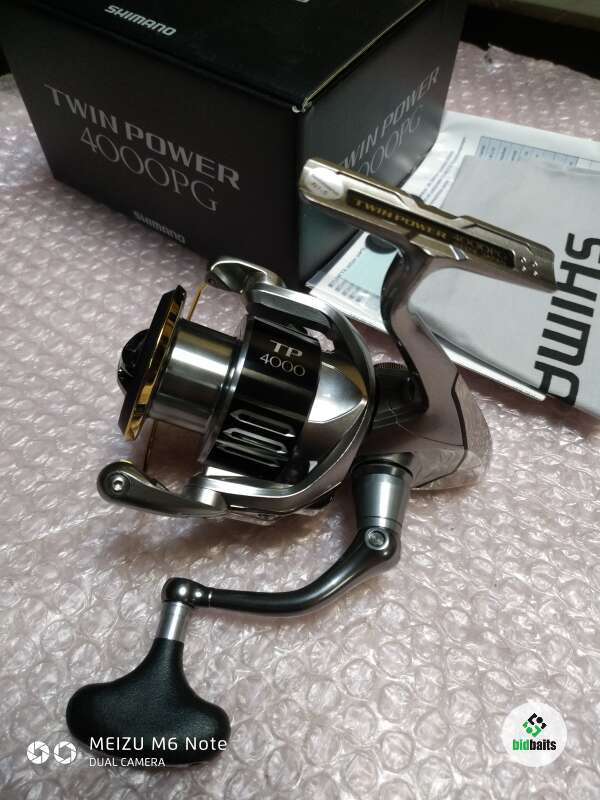 Купить Отличный Shimano 15 Twin Power 4000PG по цене 38500 руб.