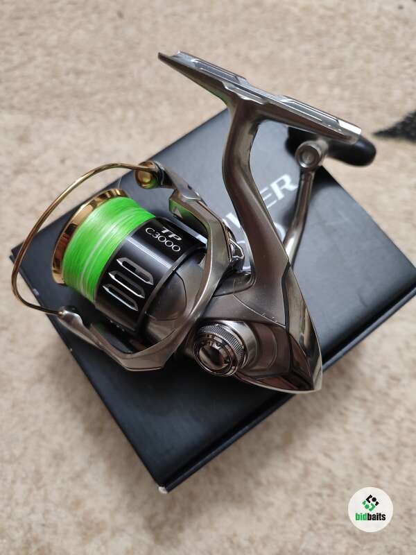 Купить Shimano 15 twin power C3000 по цене 25000 руб.