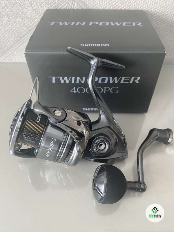 Купить Shimano 24 Twin Power 4000PG по цене 35700 руб.
